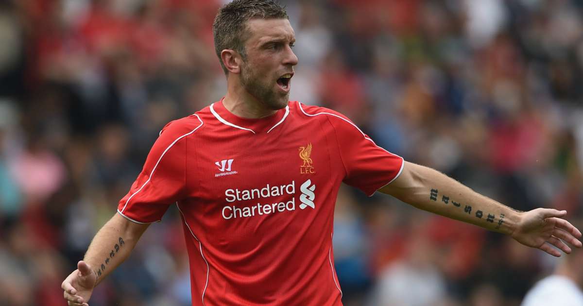 Former Liverpool and England striker Lambert retires