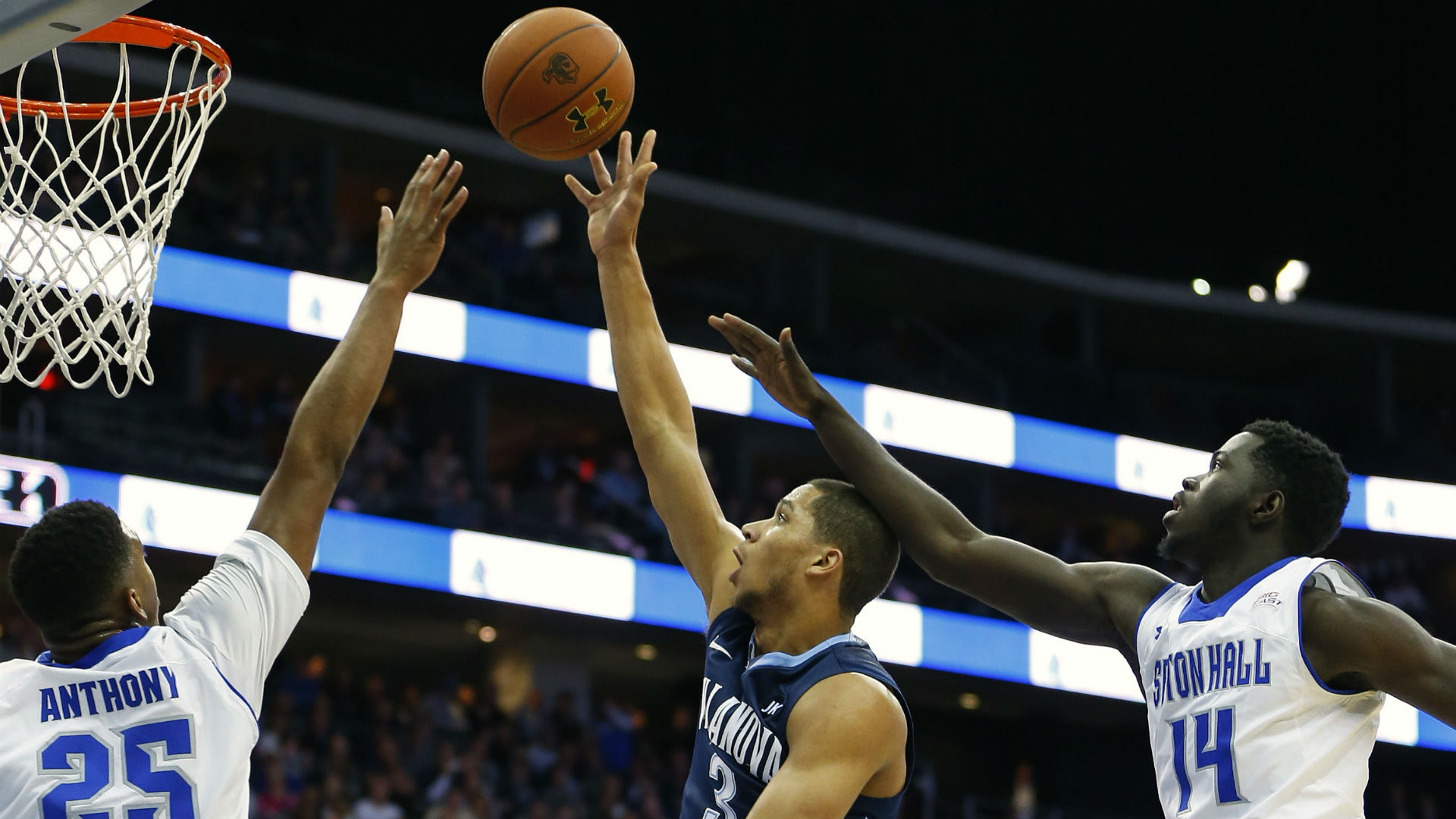 Video: College basketballer Josh Hart kicks and steps on opponent ...